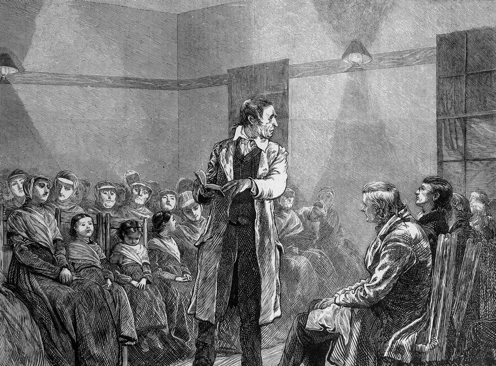 Un shaker o cuáquero en los Estados Unidos leyendo un texto