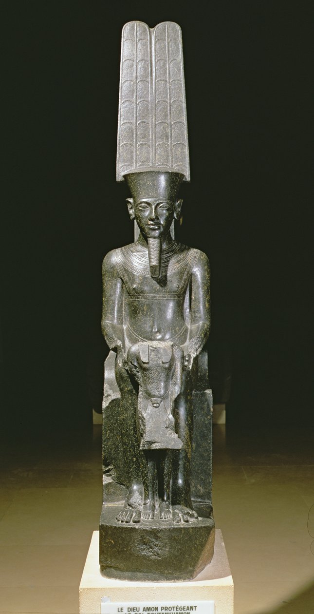 Estatua del dios Amón protegiendo a Tutankamón, Egipto, Nuevo Reino, c ...